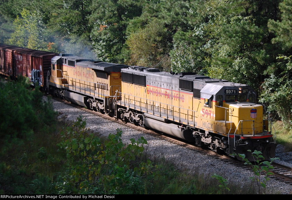 HLCX SD-60 #5971(ex UP) is head out on an eastbound freight on the Belt Line
